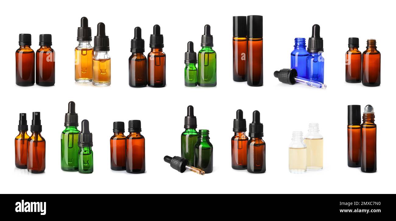 Set with bottles of different essential oils on white background ...