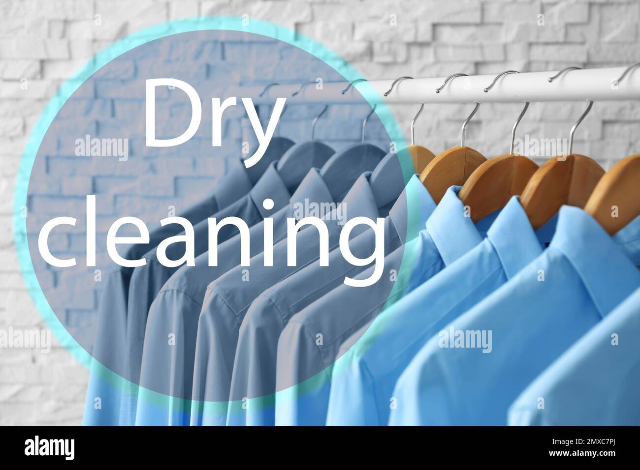 Rack with clean clothes on hangers after dry-cleaning indoors Stock ...