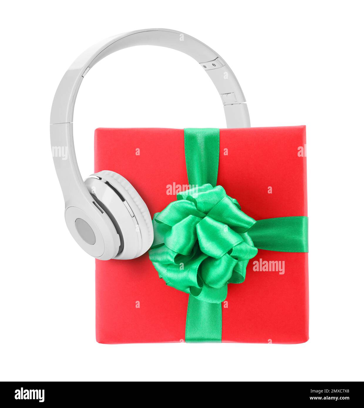 Beautiful gift box with bow and headphones on white background Stock ...