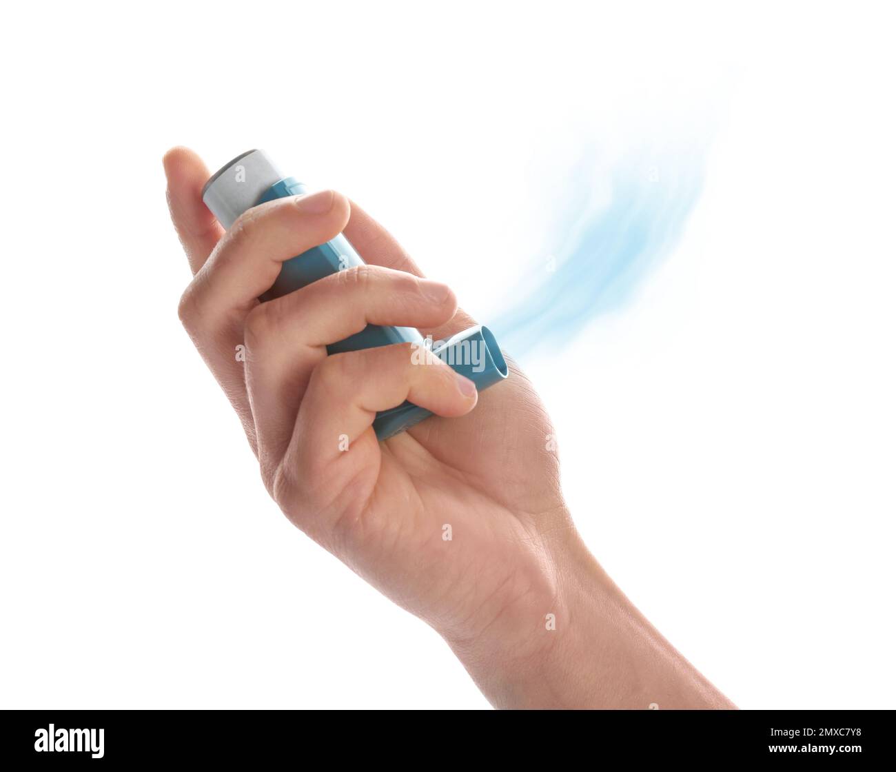 Man holding asthma inhaler with steam on white background, closeup ...