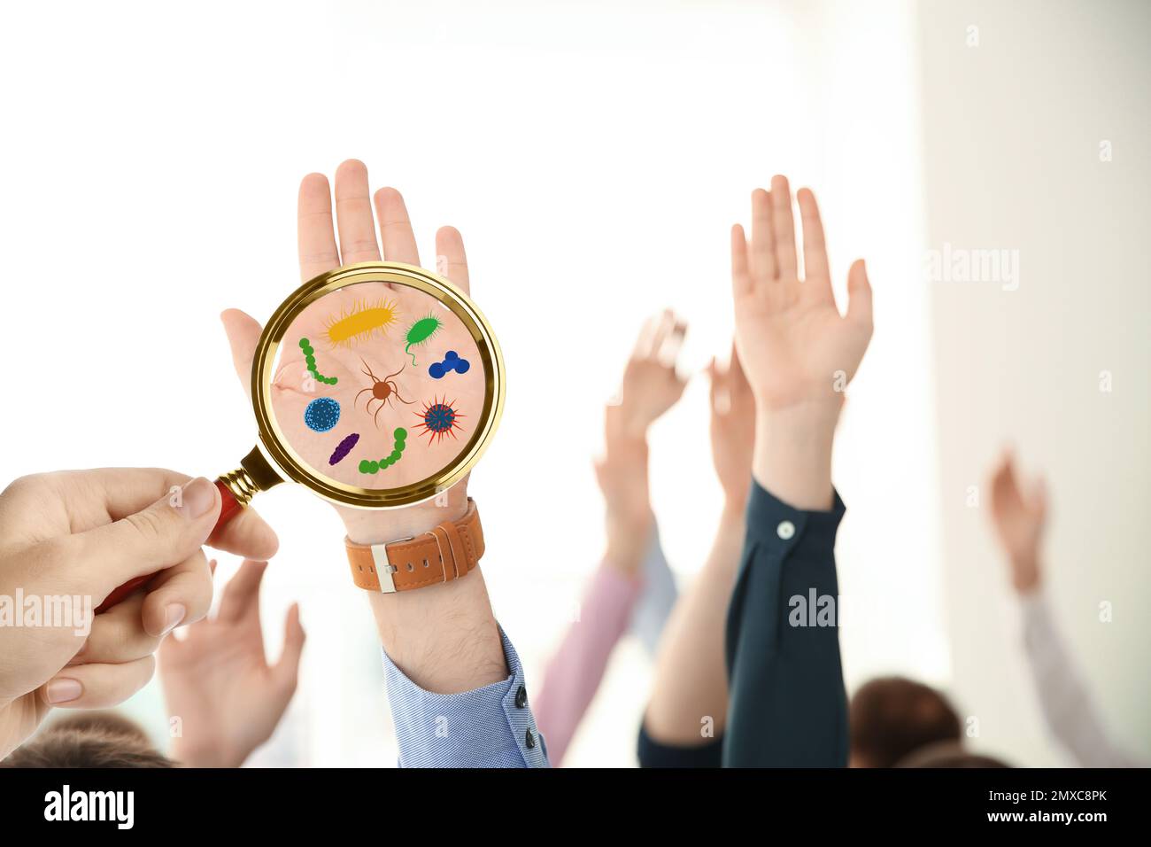 Woman detecting bacteria with magnifying glass indoors, closeup ...