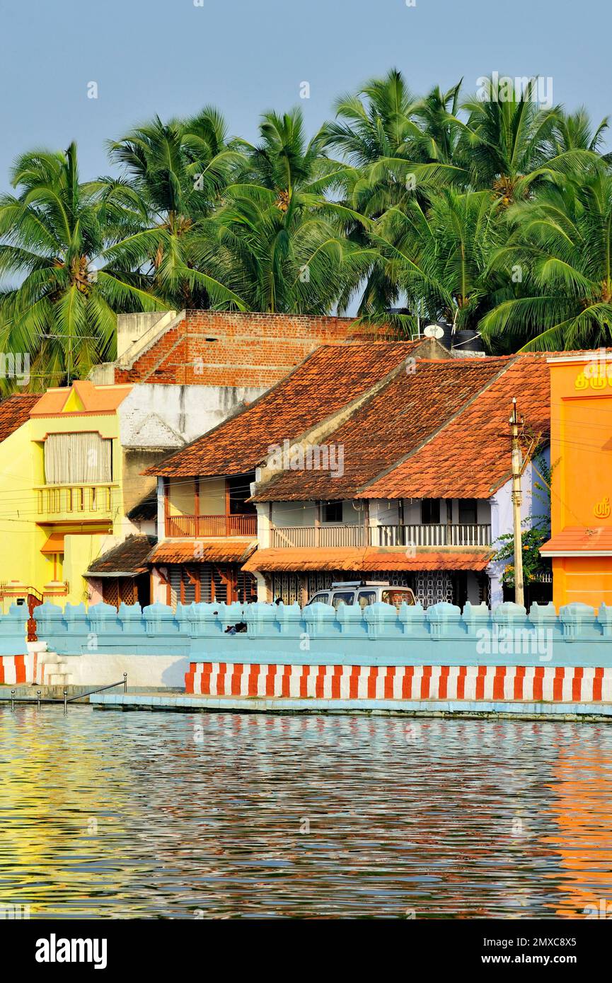 South Indian traditional village houses near tank at Suchindram state ...