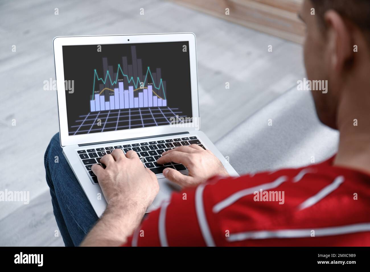 Male broker using computer home hi-res stock photography and images - Alamy