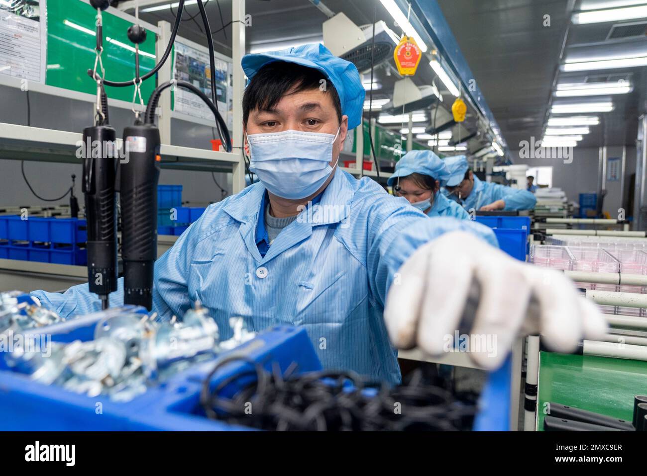 KUNSHAN, CHINA - FEBRUARY 2, 2023 - Workers work on the smart lock ...
