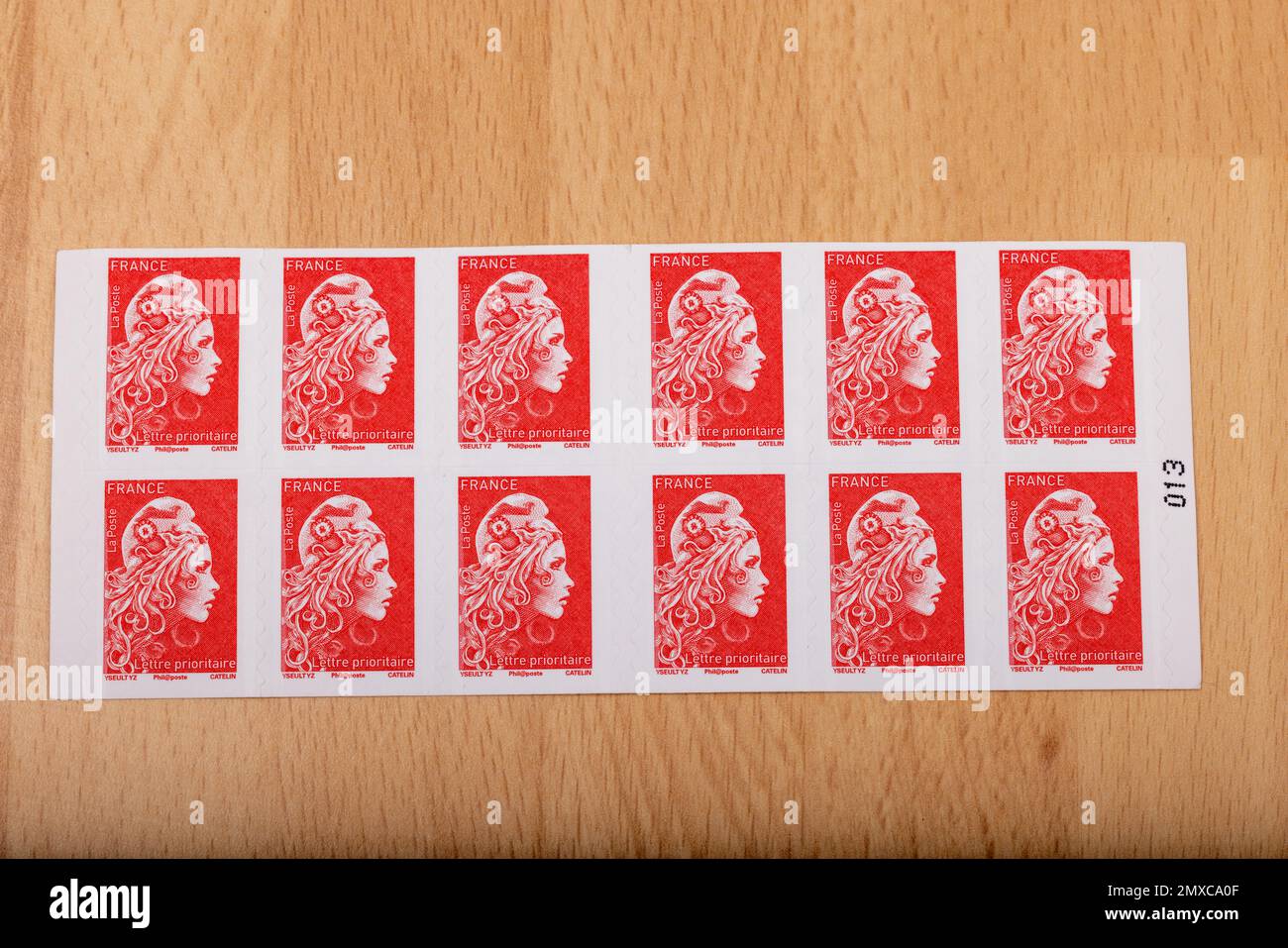 Paris, France - January 01, 2023 :The red stamp of the Post Office, to ...