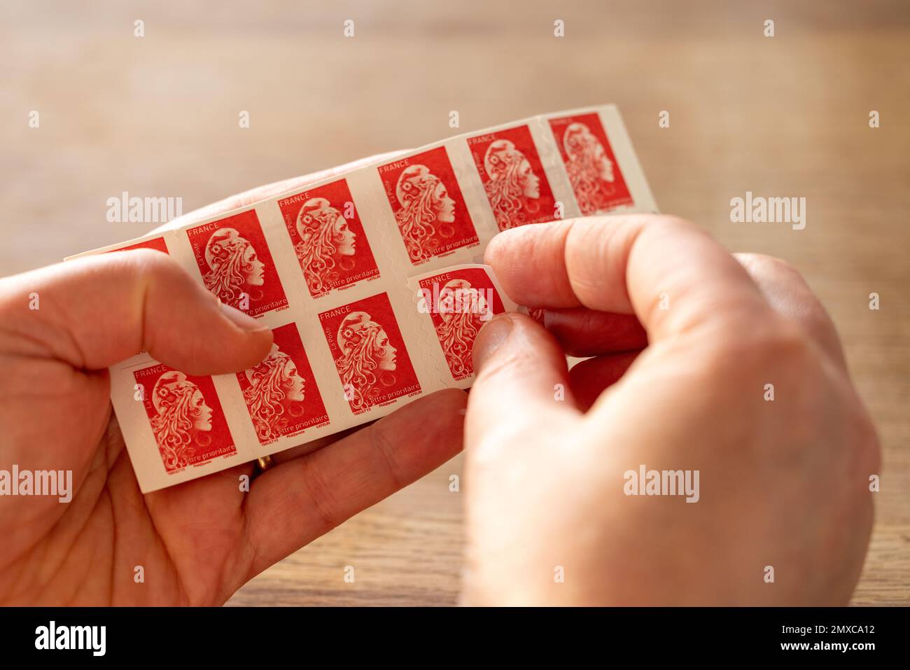 Paris, France - January 01, 2023 :The red stamp of the Post Office, to ...
