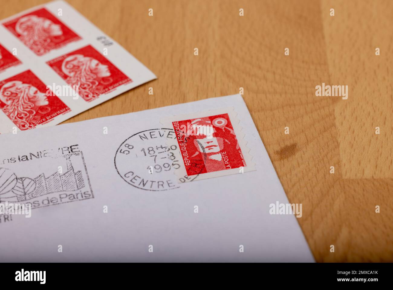 Paris, France - January 01, 2023 :The red stamp of the Post Office, to ...