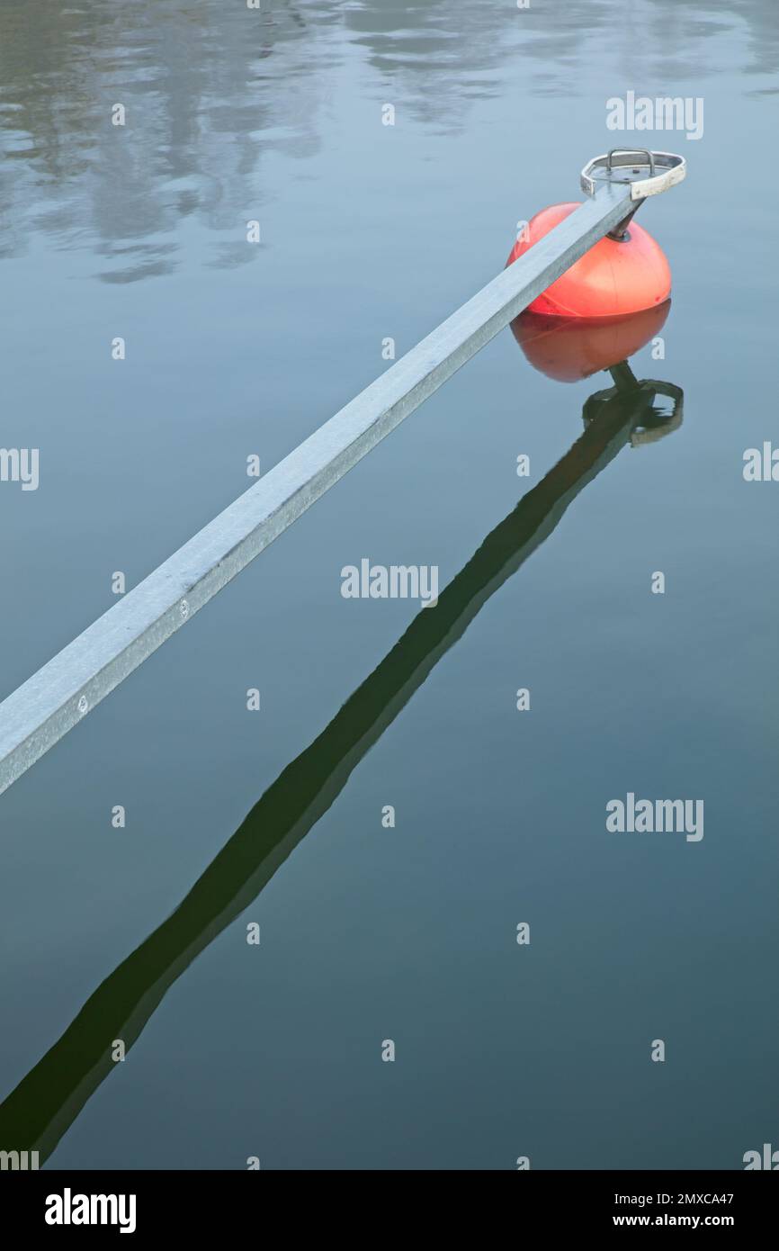 Shaft with buoy in unfrozen water in winter, Tirmo, Porvoo, Finland ...