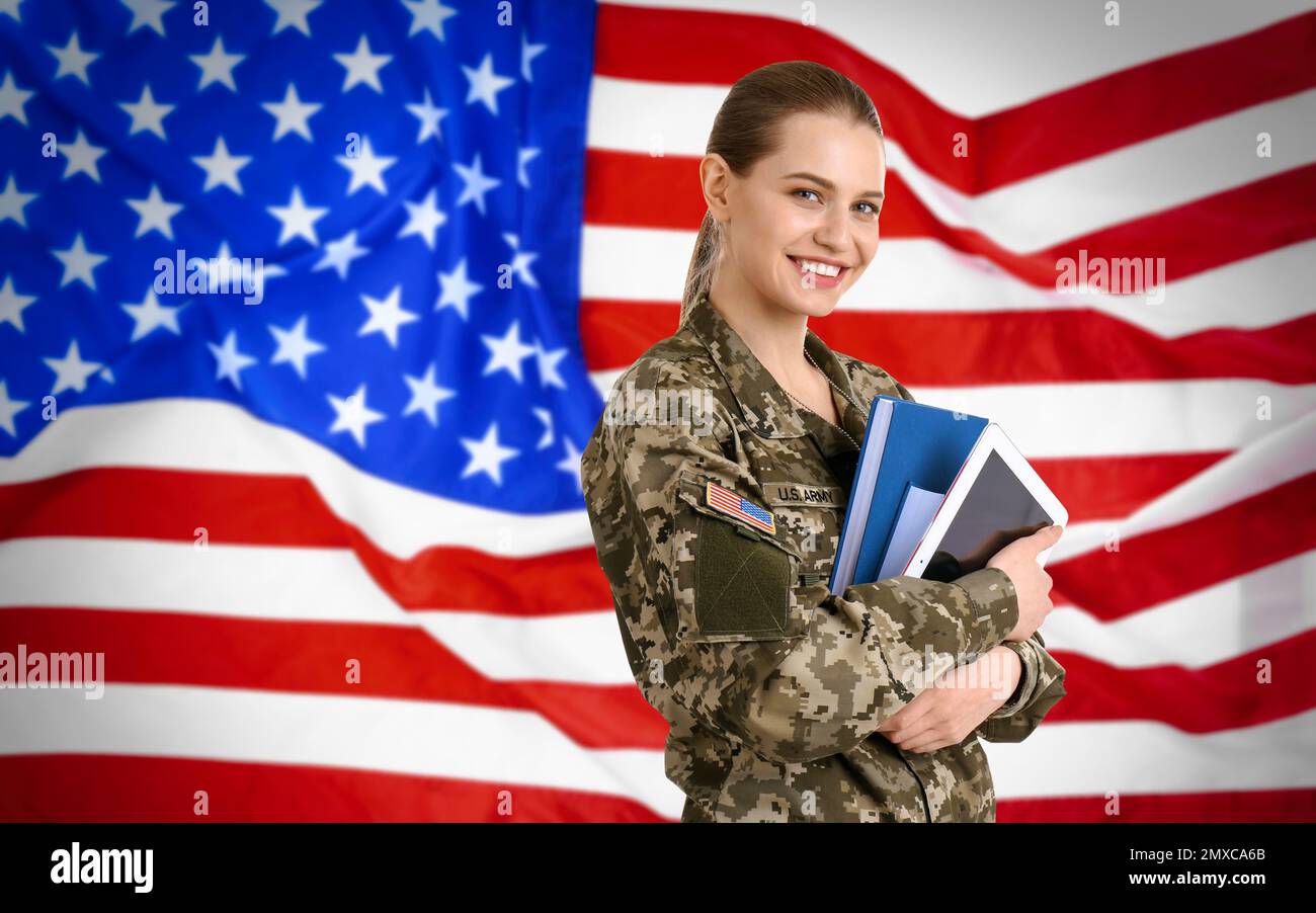 Female soldier with books and American flag on background. Military ...