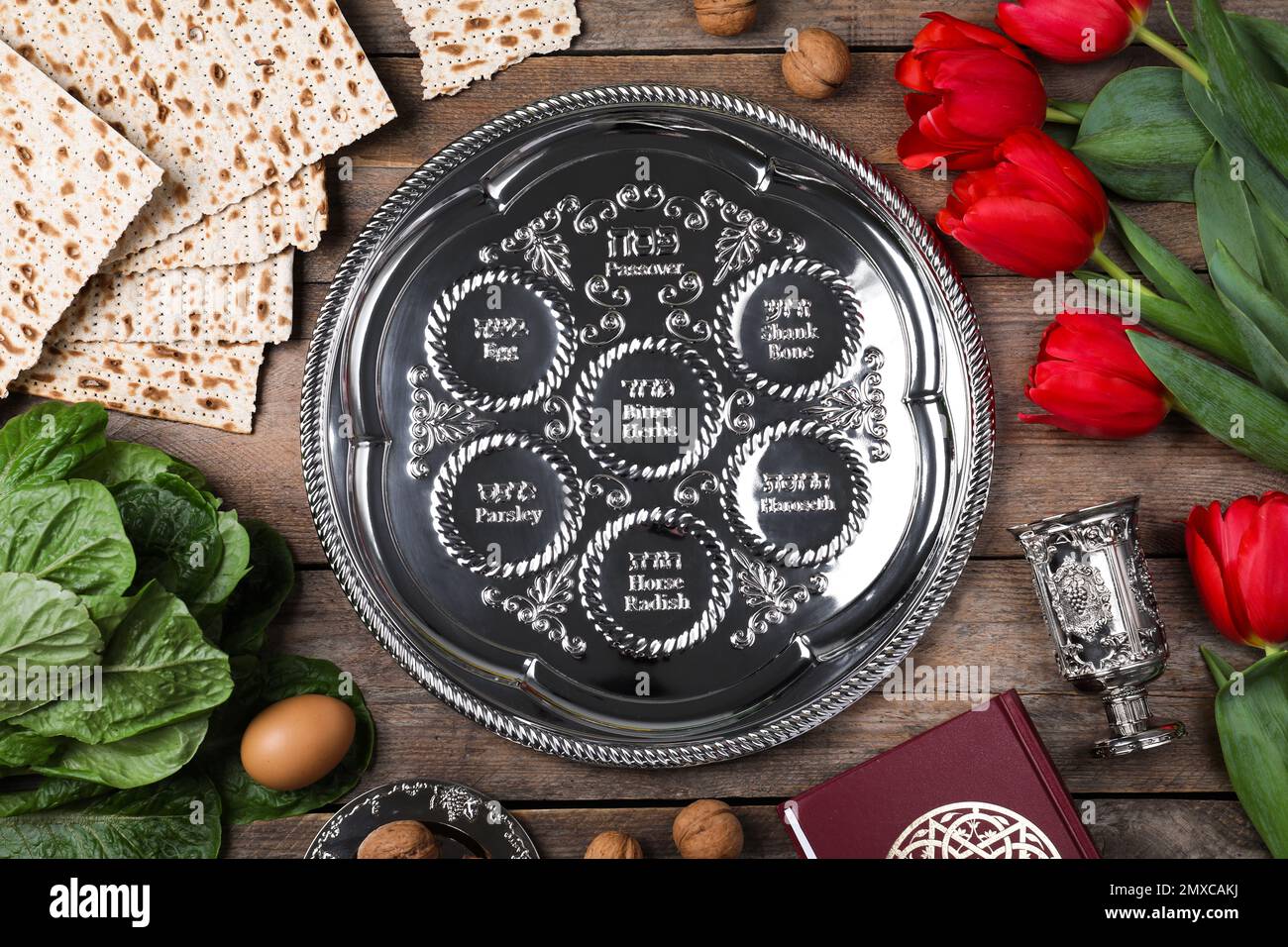 Flat lay composition with Passover Seder plate (keara) on wooden table ...