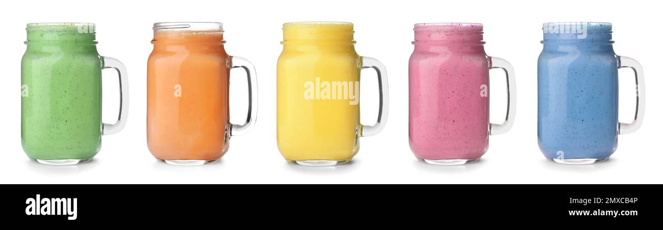 Set of different fresh tasty smoothies on white background. Banner ...