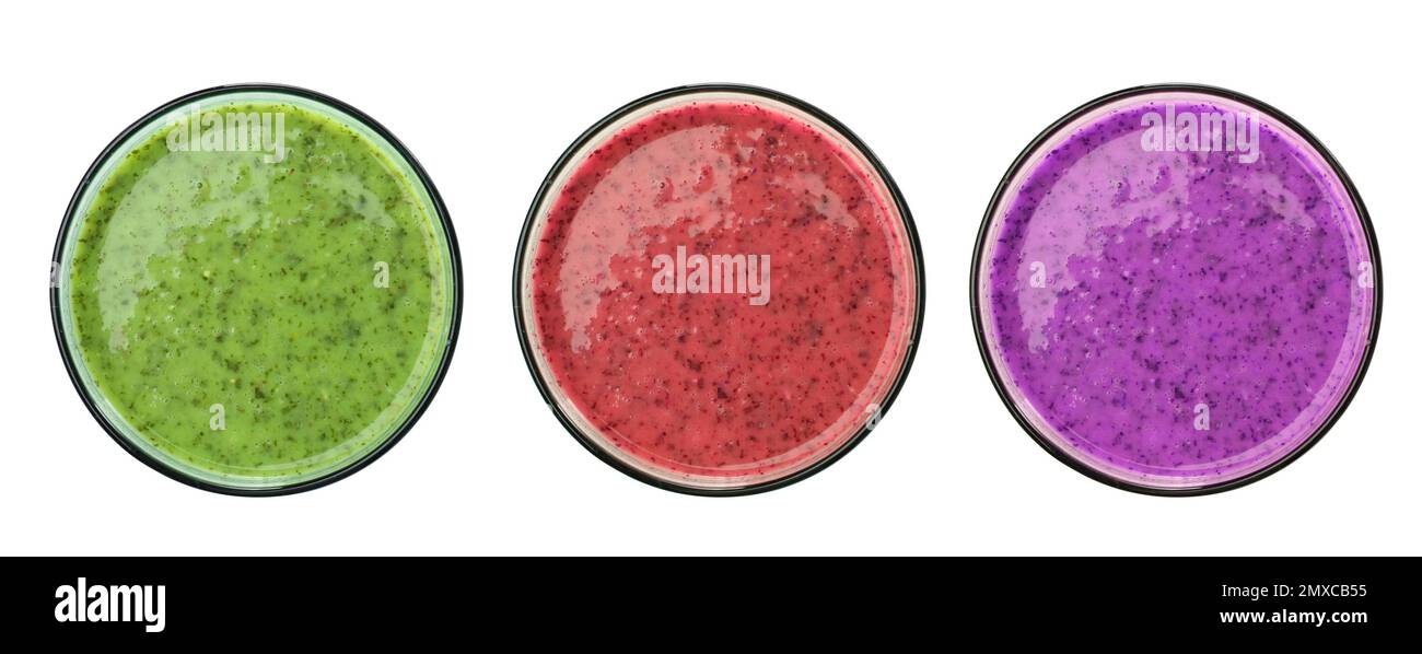 Set of different fresh tasty smoothies on white background, top view ...