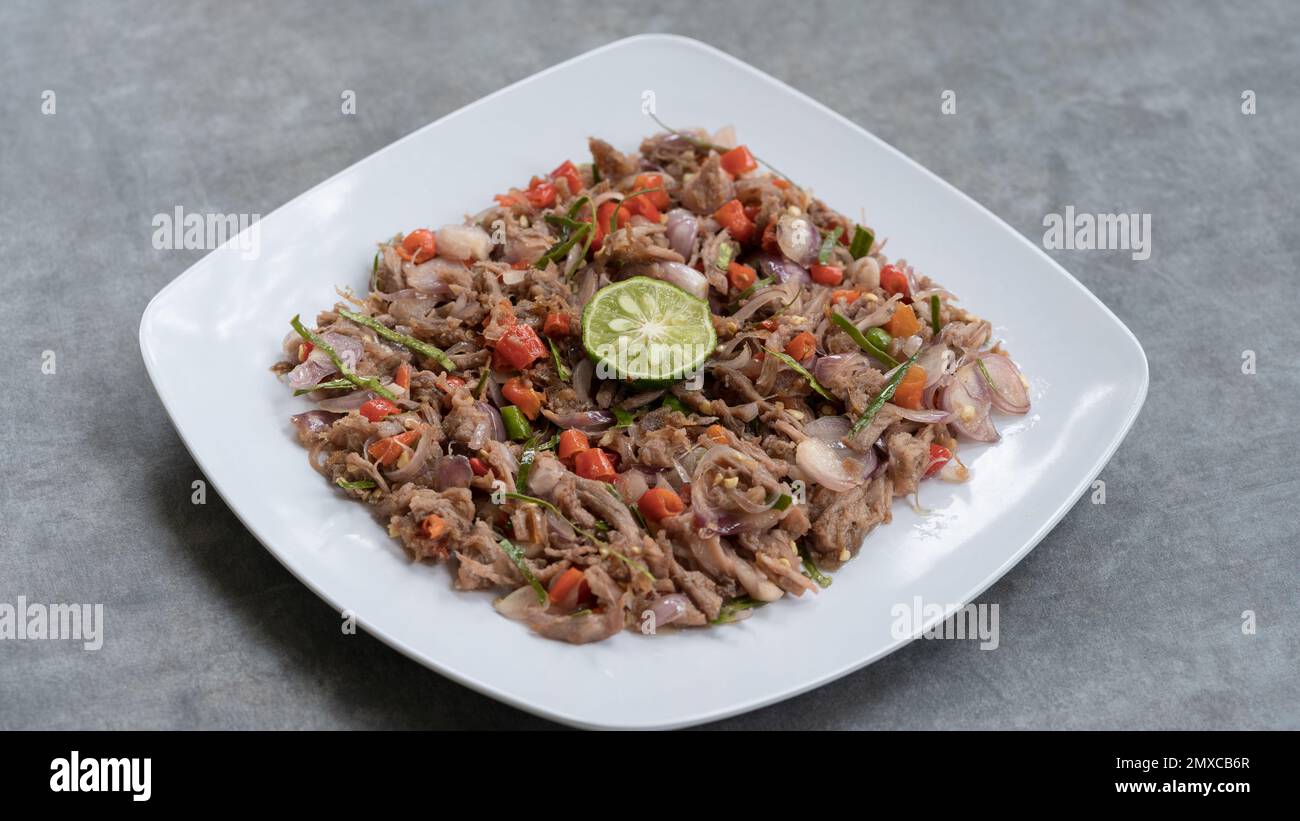 chicken or beef with traditional Indonesian sambal. Onions, chilies ...