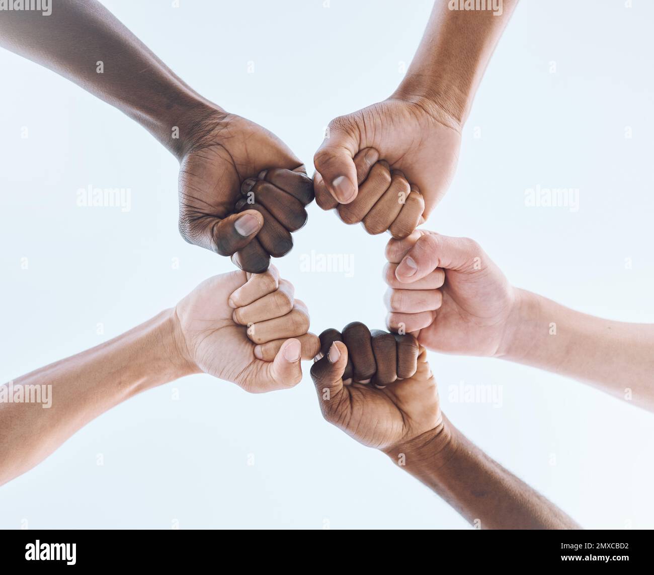 People, team and hands or fist bump of men in support of sport ...