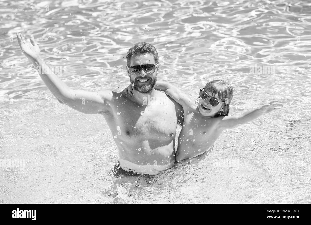 happy family of daddy and child having fun in summer swimming pool, free time Stock Photo - Alamy