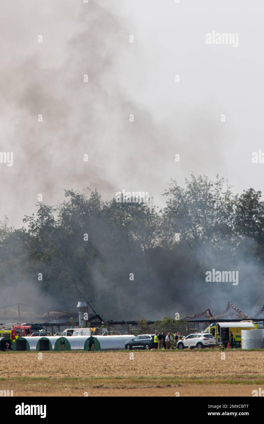 Smoke rising from a serious fire on a small industrial estate set in ...