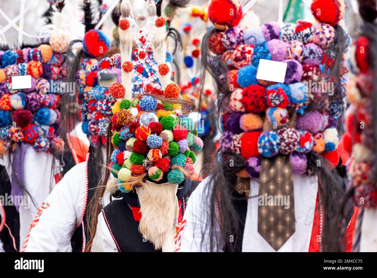 Kukeri dancers with colourful masks from Northeastern Bulgaria at Surva ...