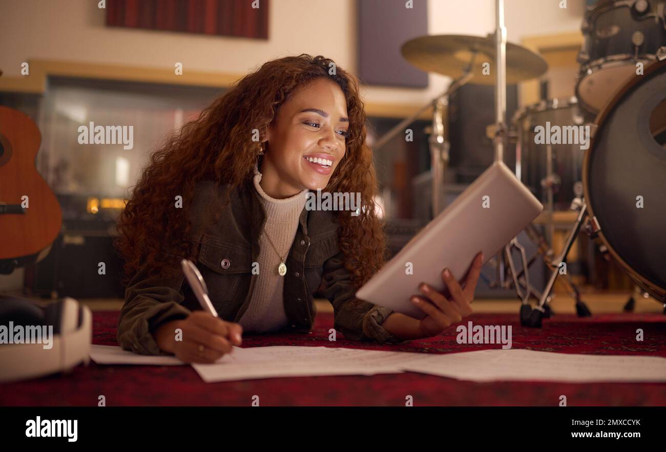 Digital tablet, songwriter and woman writing idea for music, sound or ...