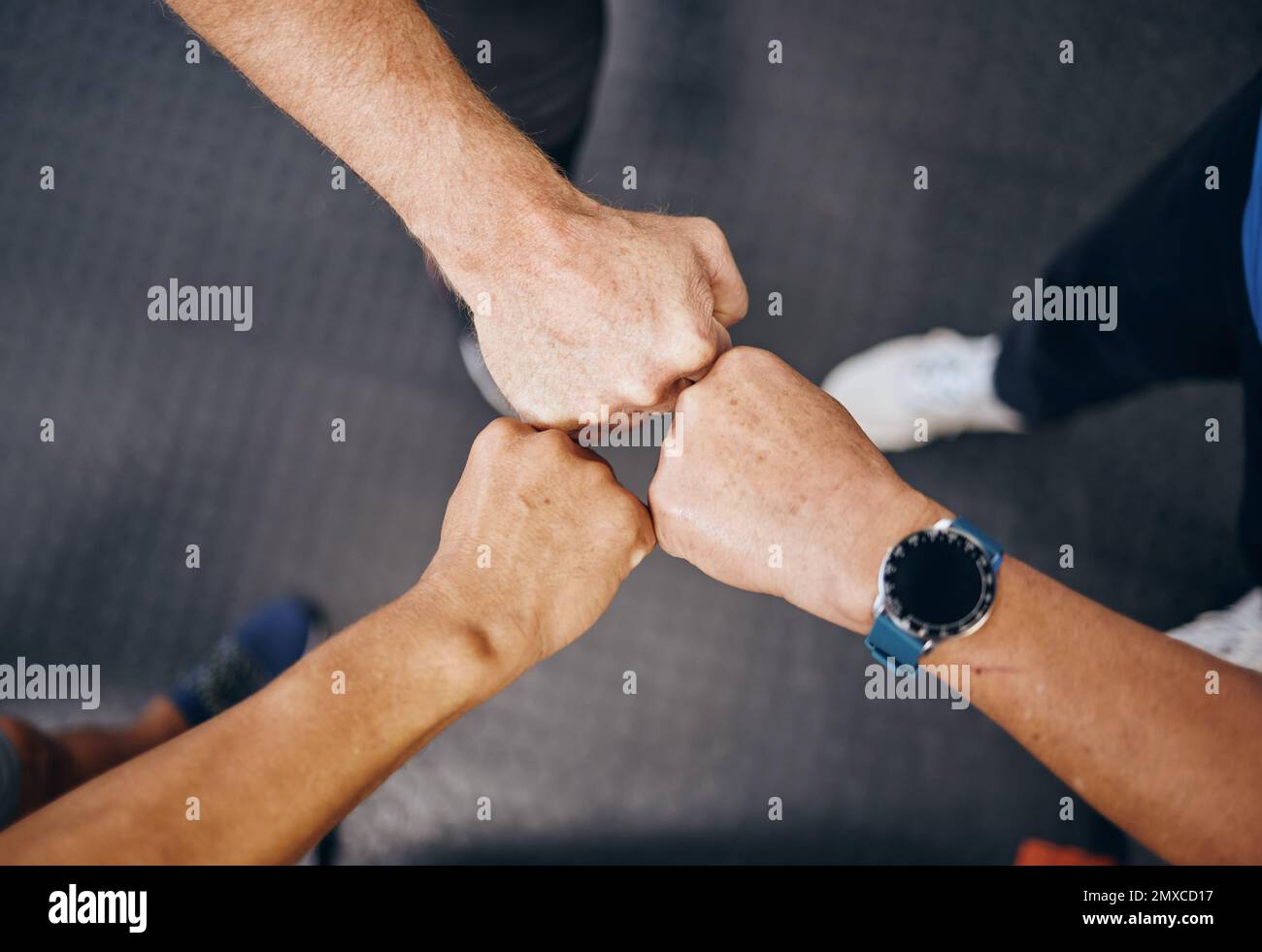 Fist bump, motivation in workout in gym, training or exercise for ...