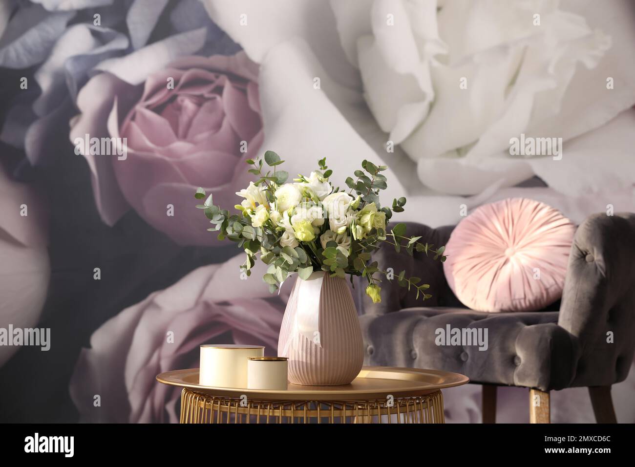 Beautiful bouquet of flowers on table in room. Stylish interior design ...