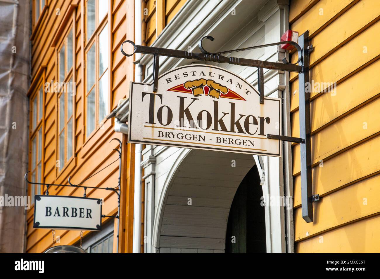 Shop signs on historic hanseatic buildings in Bryggen, Bergen, Norway ...
