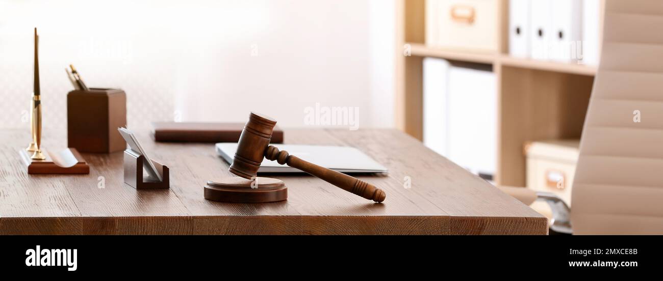 Table with judge gavel in lawyer's office. Banner design Stock Photo ...
