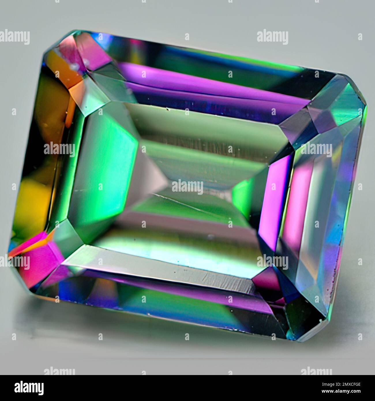 Natural gem mystic quartz isolated on white background Stock Photo - Alamy