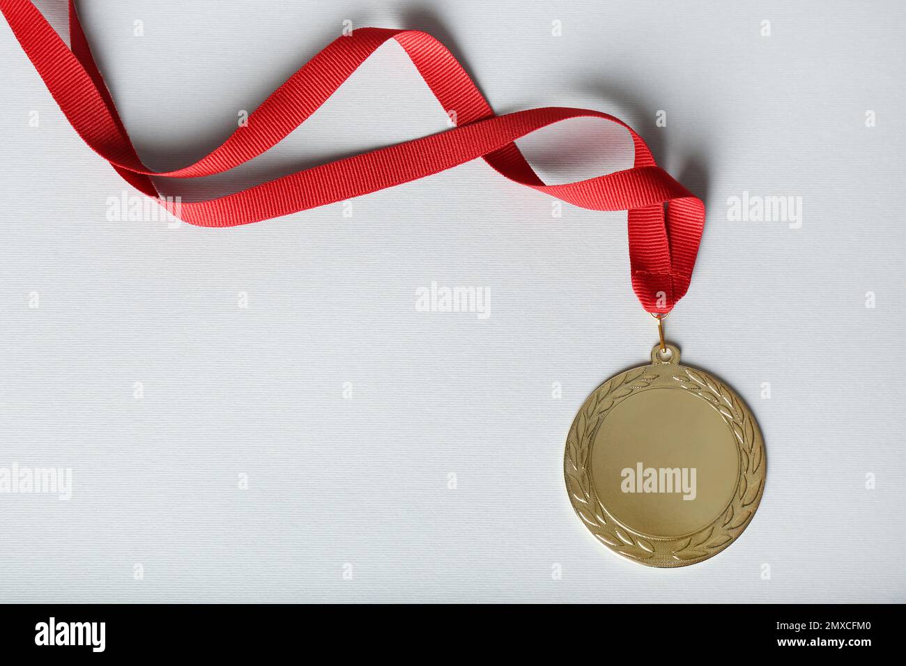 Gold medal on white background, top view. Space for design Stock Photo ...