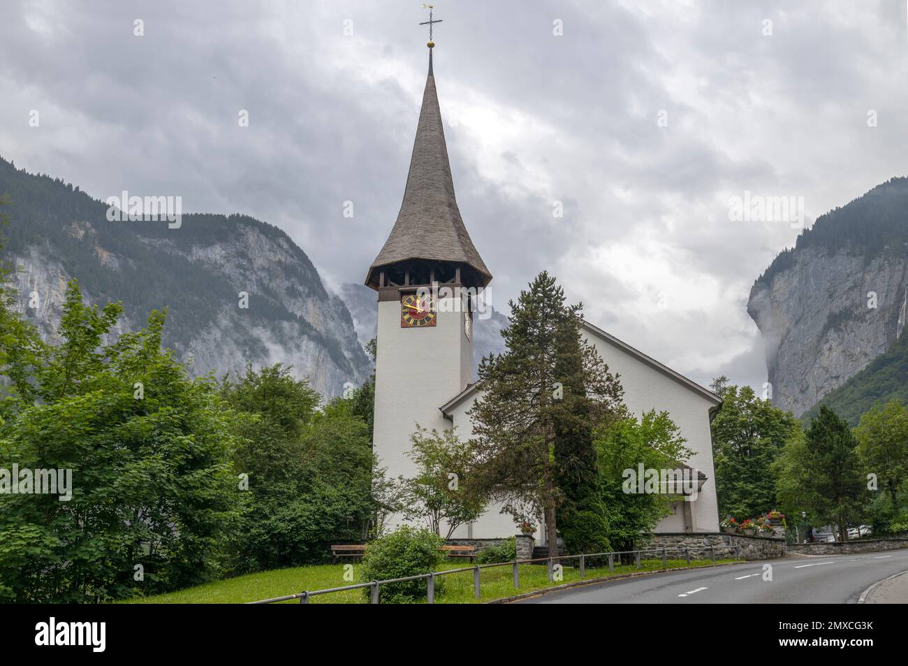The church in the alpine town of Lauterbrunnen in the Bernese Oberland ...