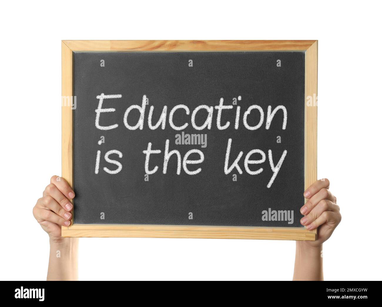 Woman holding blackboard with phrase Education is the key on white ...
