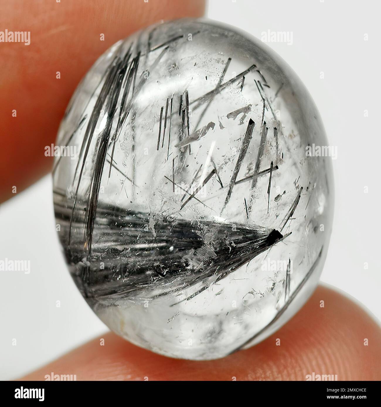 Natural gem rutile quartz isolated on white background Stock Photo - Alamy