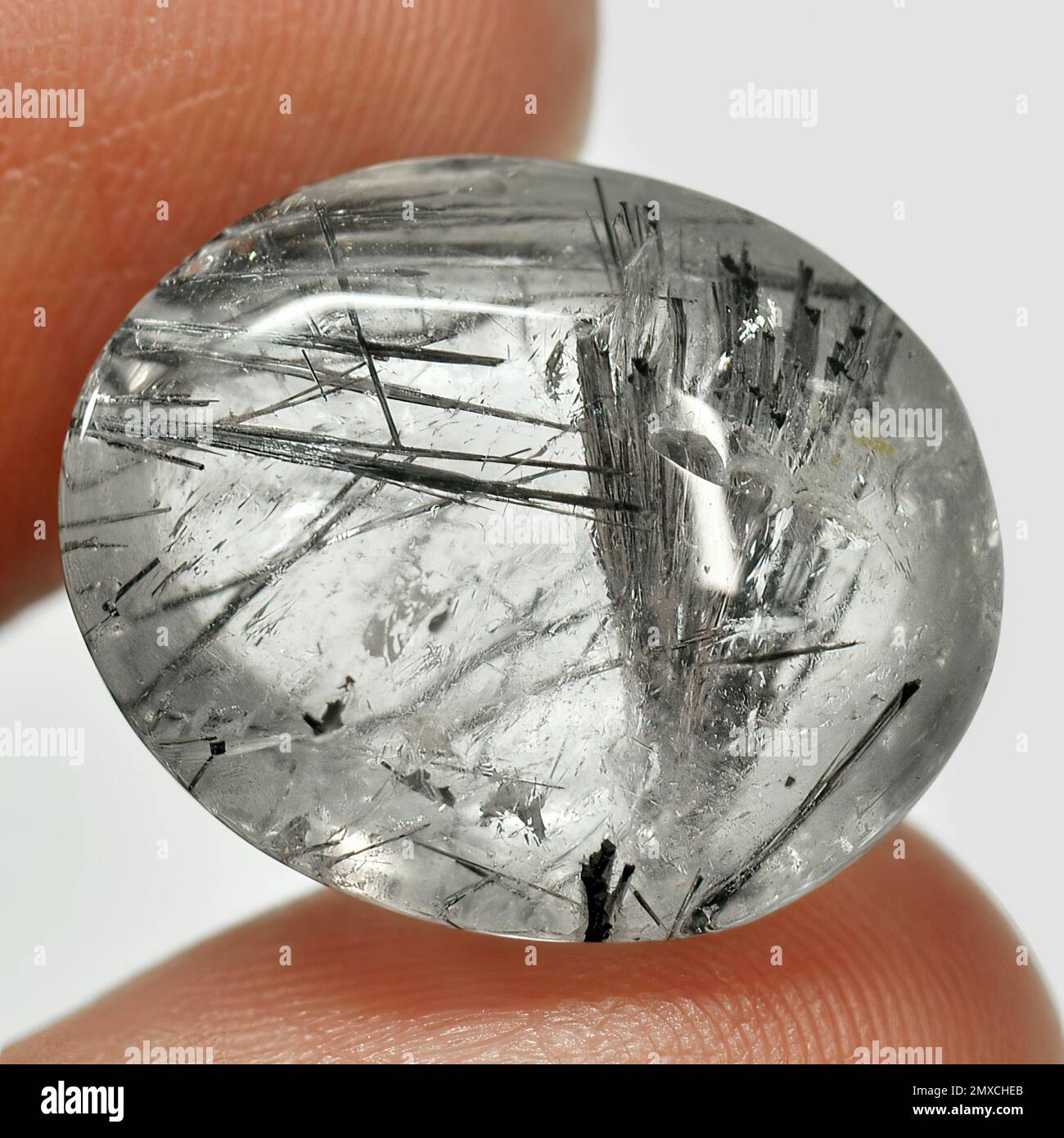 Natural gem rutile quartz isolated on white background Stock Photo - Alamy