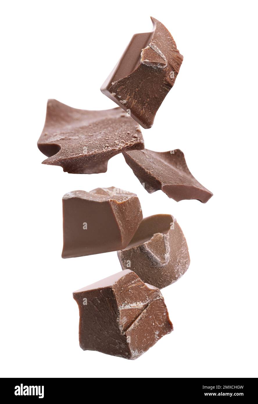 Delicious chocolate chunks falling on white background Stock Photo - Alamy