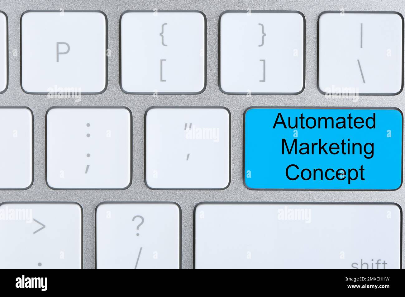 Modern computer keyboard with text AUTOMATED MARKETING CONCEPT on ...
