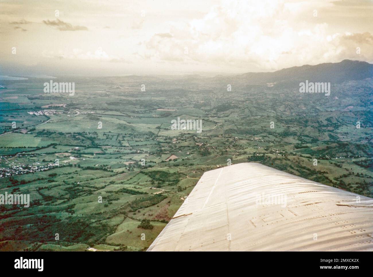 Aerial view from aircraft on countryside in northern Puerto Rico 1961 ...