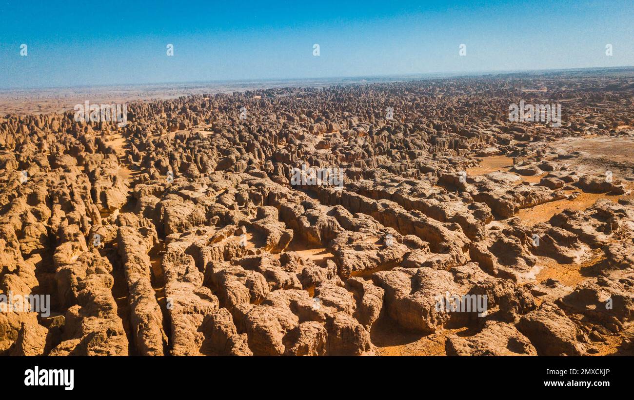 A drone shot of ruins of old lost and fossilized city Sefar in Algeria ...