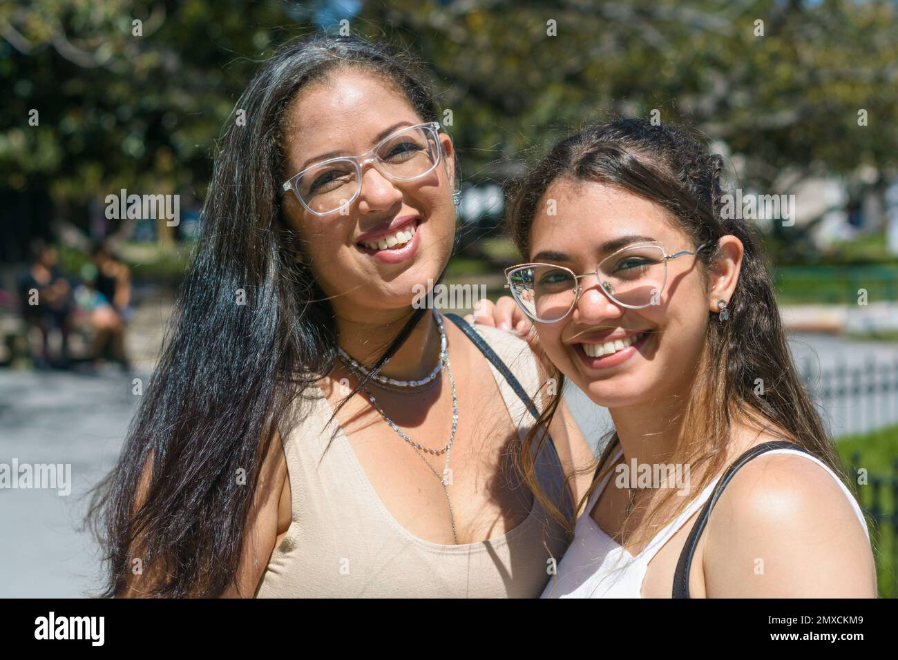 portrait of two young latina tourist women of venezuelan ethnicity ...