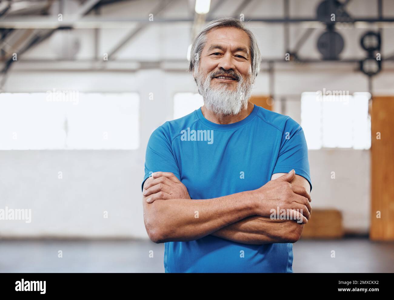 Motivation, fitness and portrait of Asian man in gym with crossed arms ...