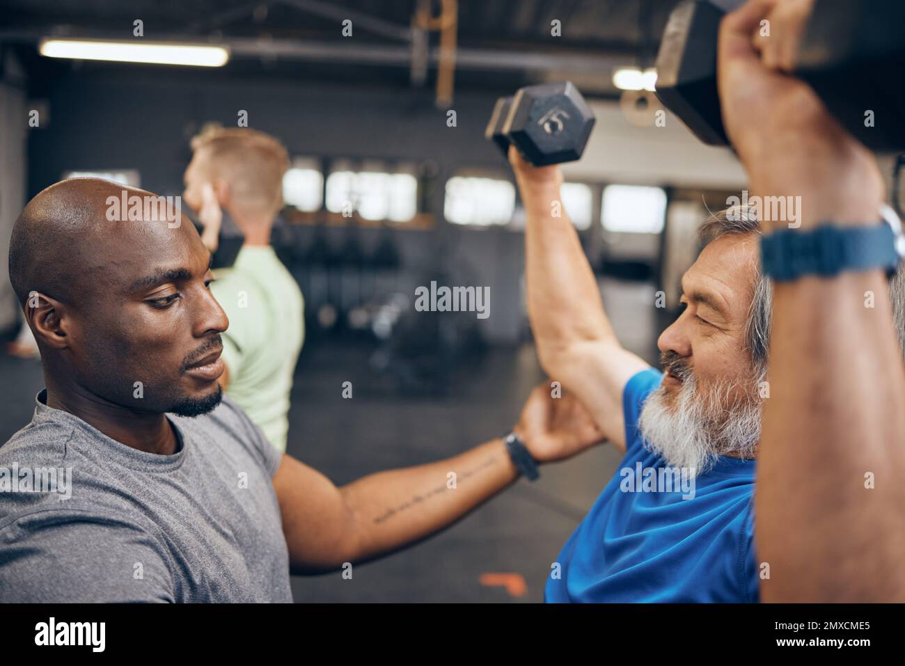 Fitness, old man and personal trainer coaching with dumbbell ...