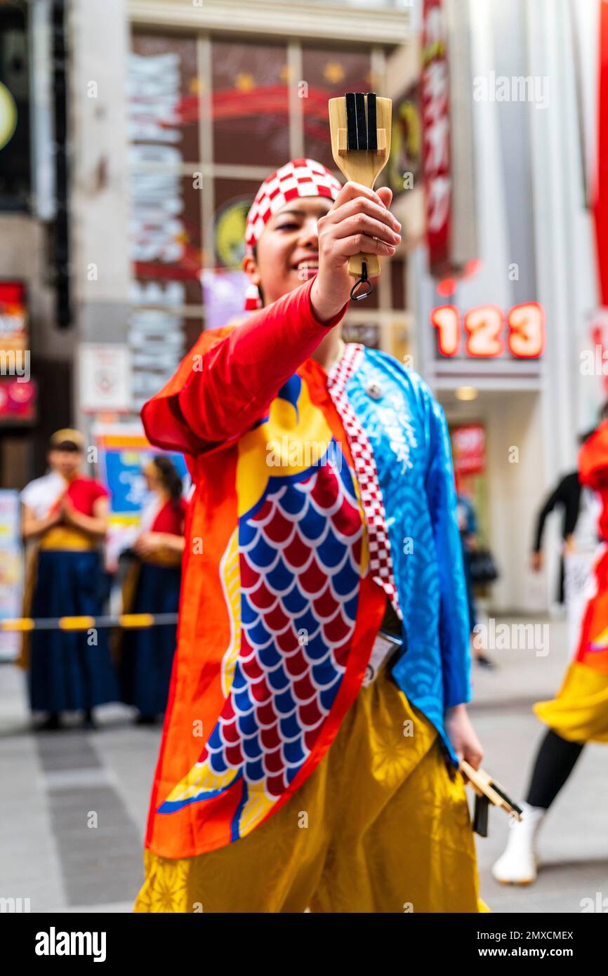Close up, Japanese young woman Yosakoi dancer dancing and holding ...