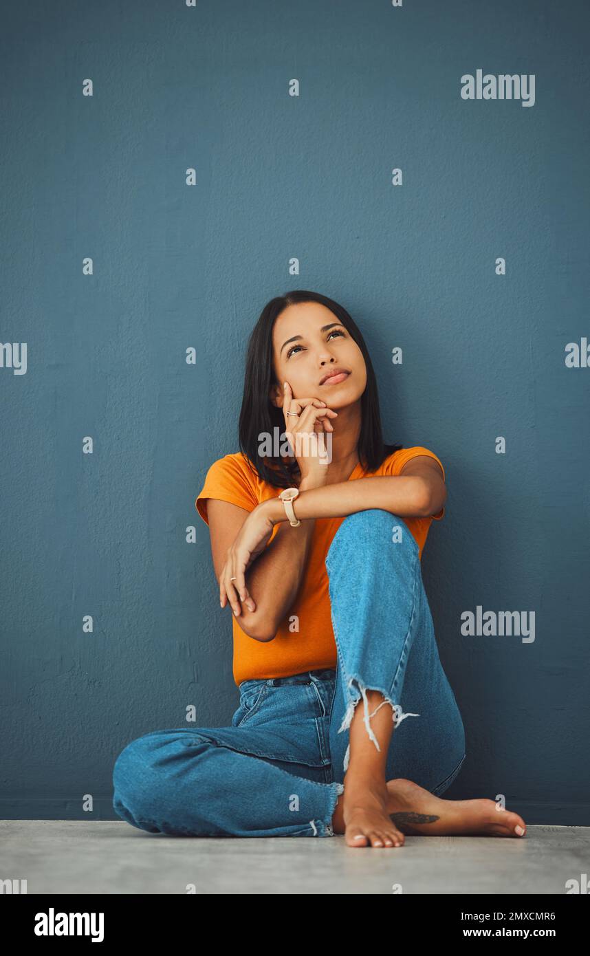 Woman on ground, thinking and decision for opportunity, ideas and girl ...
