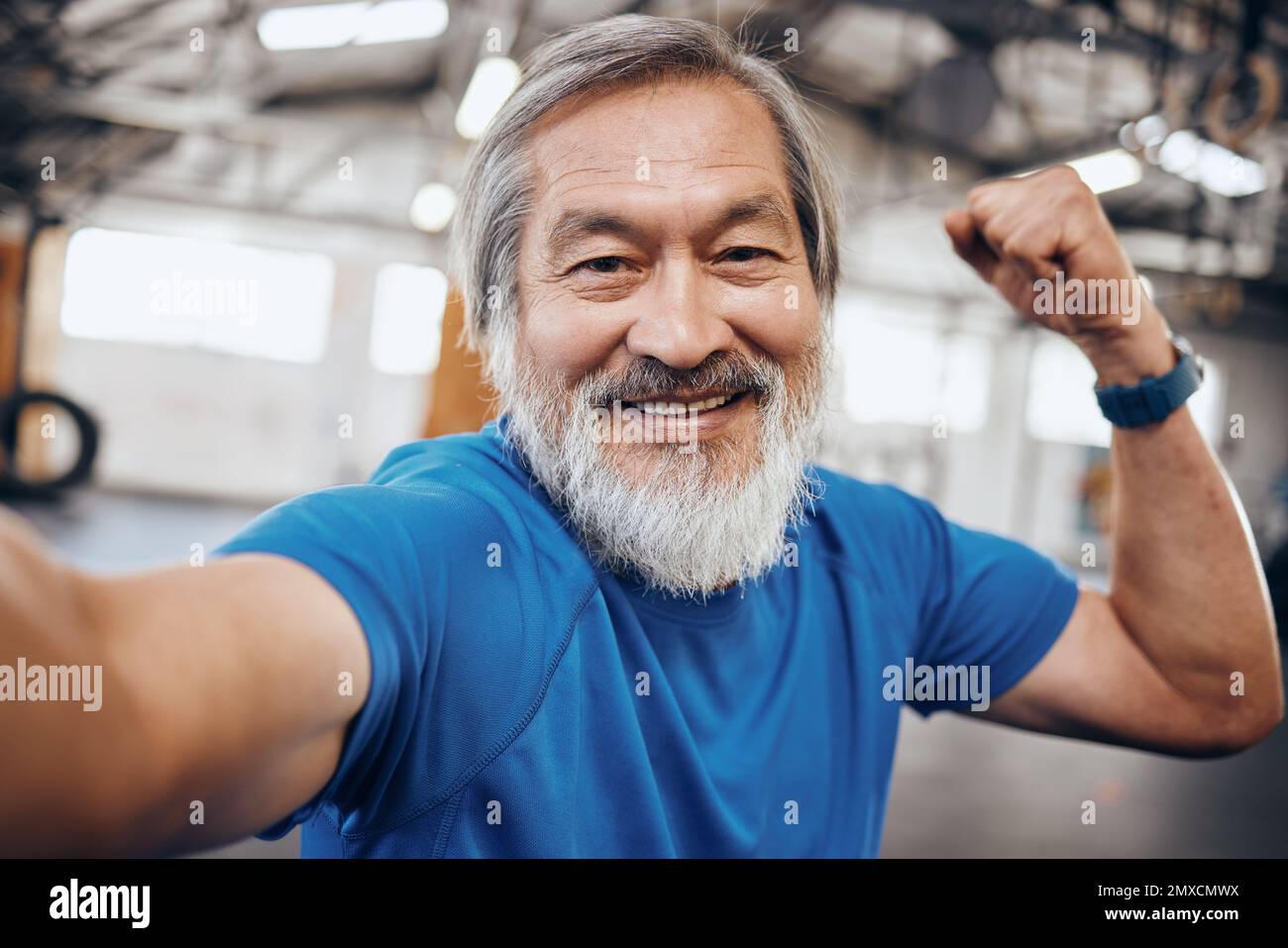 Fitness, muscle and selfie portrait of Asian man in gym show biceps for motivation, wellness and ...
