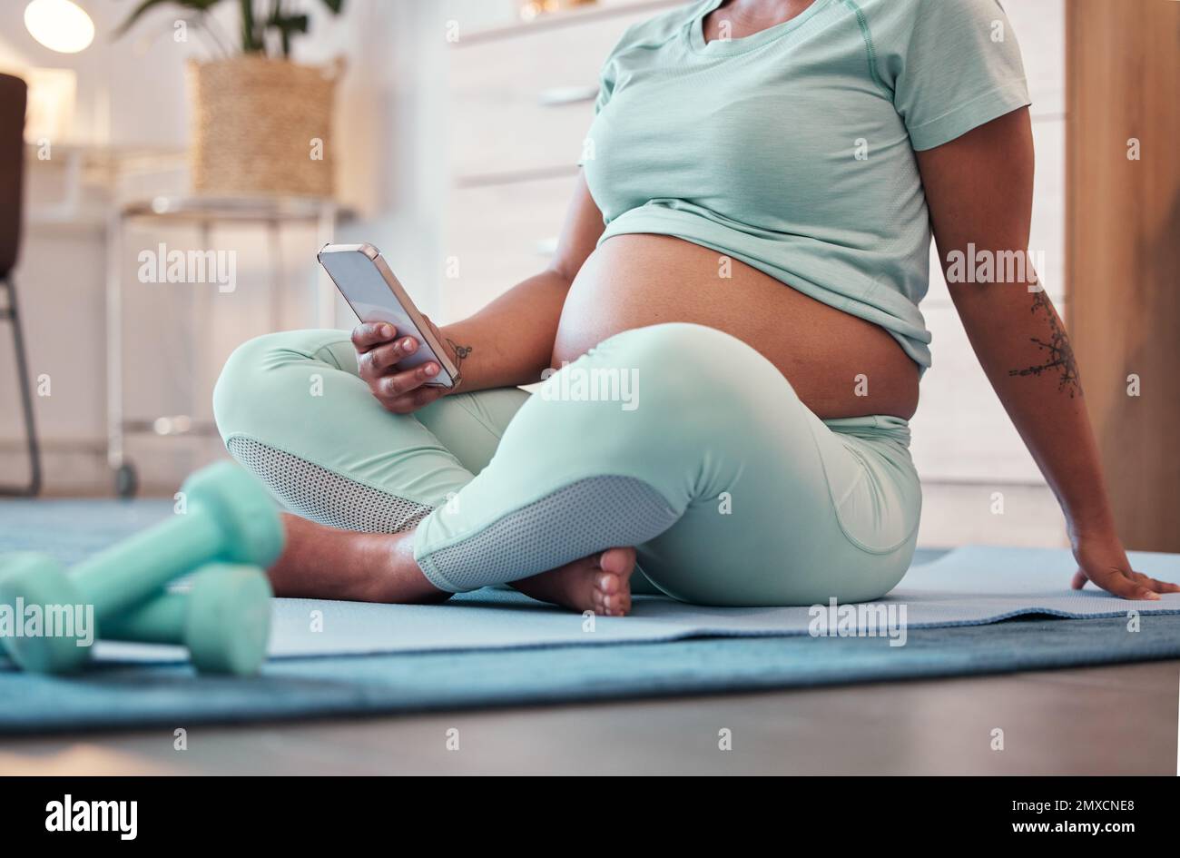 Yoga, pregnant black woman and hands with phone for social media and ...