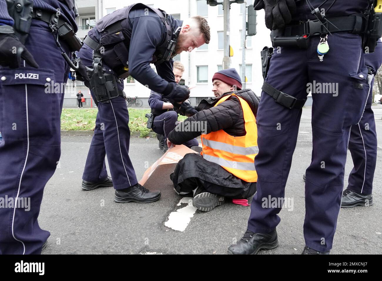 Cologne, Germany. 03rd Feb, 2023. Police officers stand around an ...