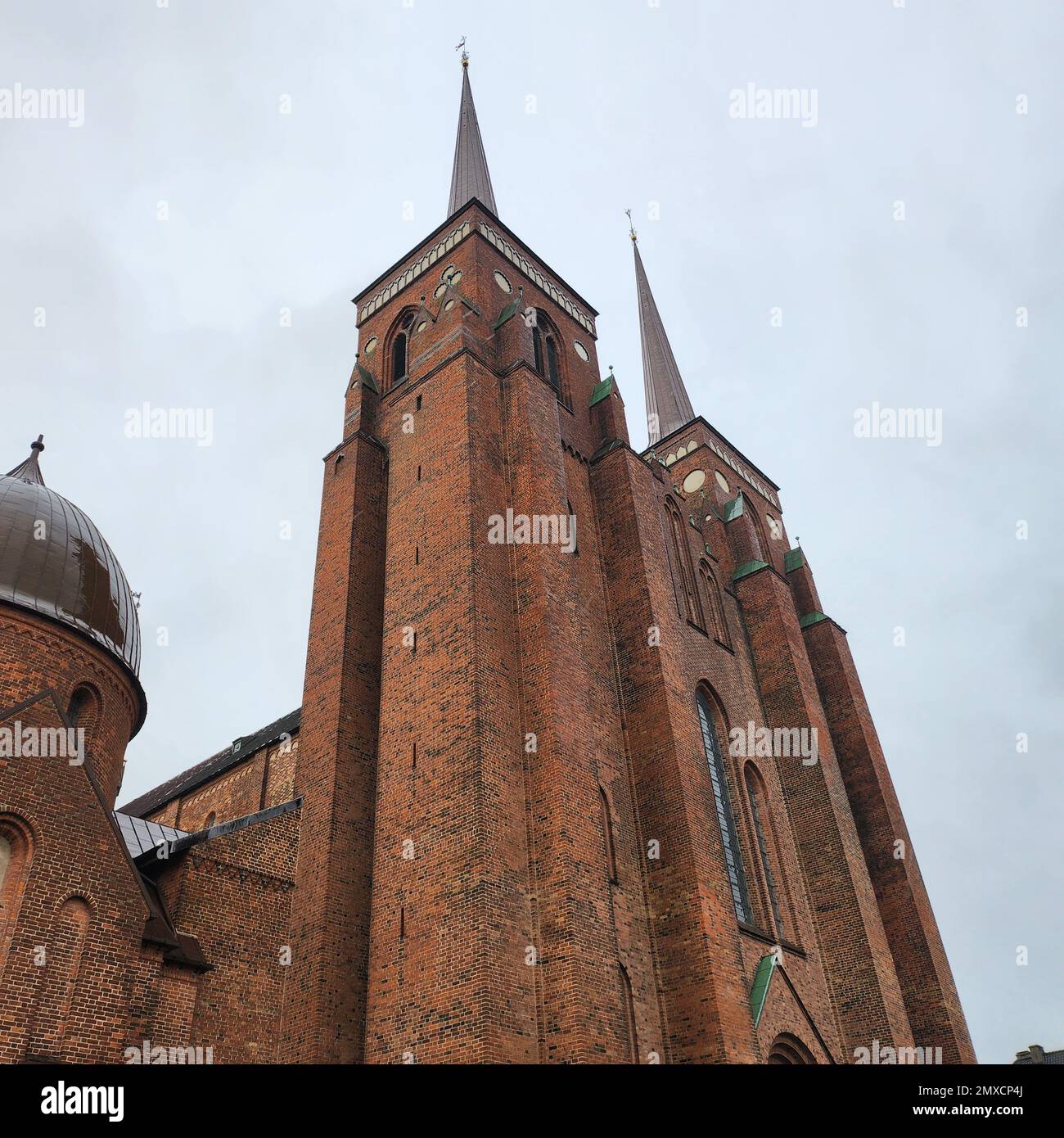A vertical shot of the Roskilde Cathedral in Denmark Stock Photo - Alamy