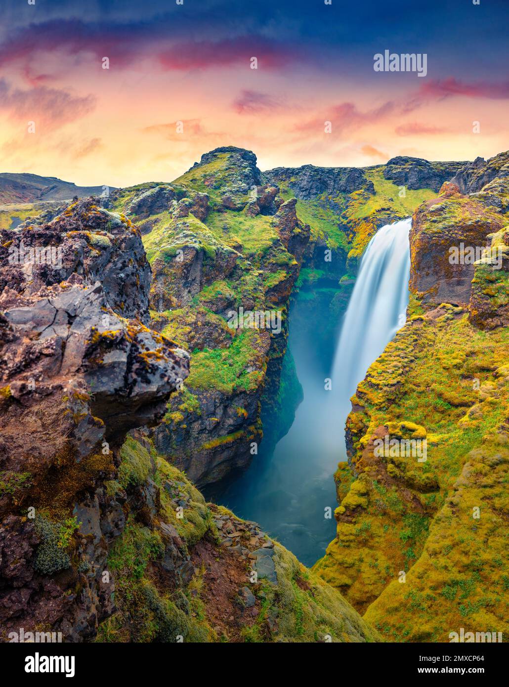 Landscape photography. Colorfuul summer sunrise on waterfall on Skoga ...