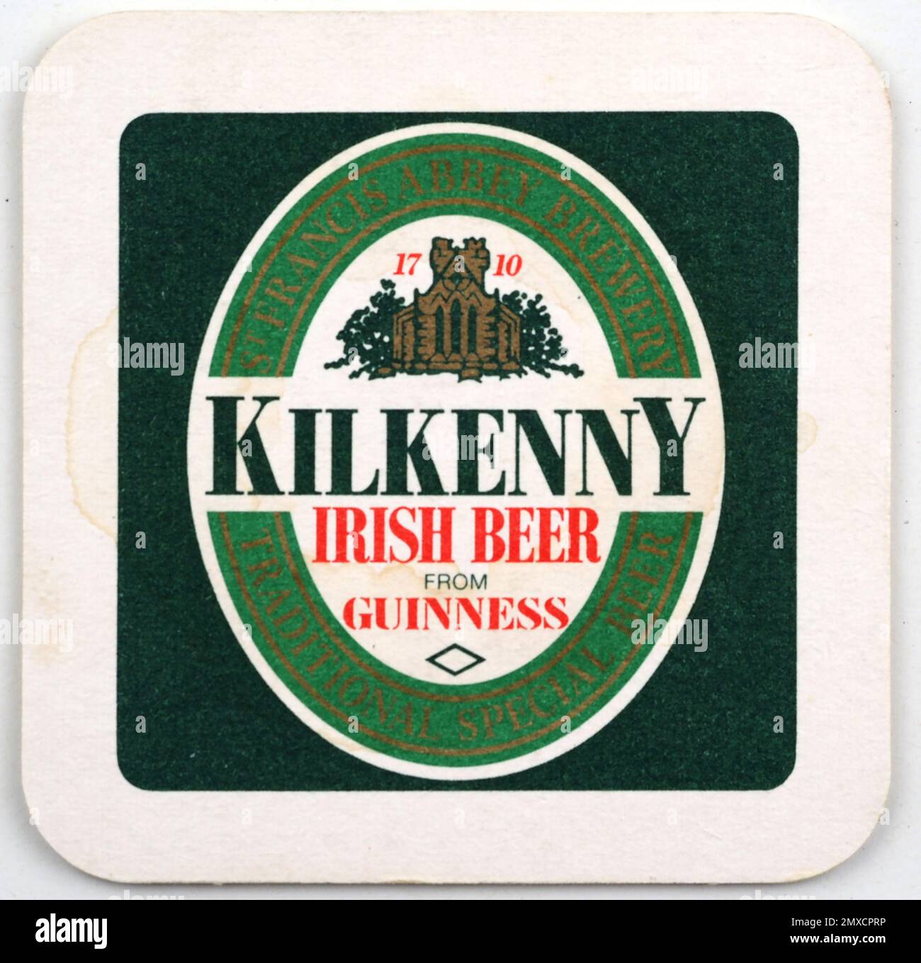 Vintage cardboard beer coaster with logo Guinnes. Guinness is a beer ...