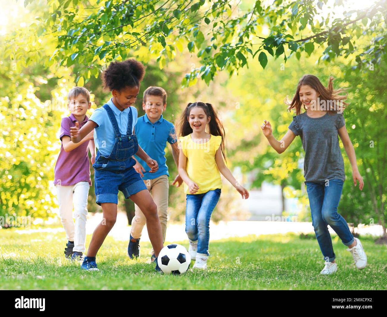 Teen girls playing soccer hi-res stock photography and images - Alamy