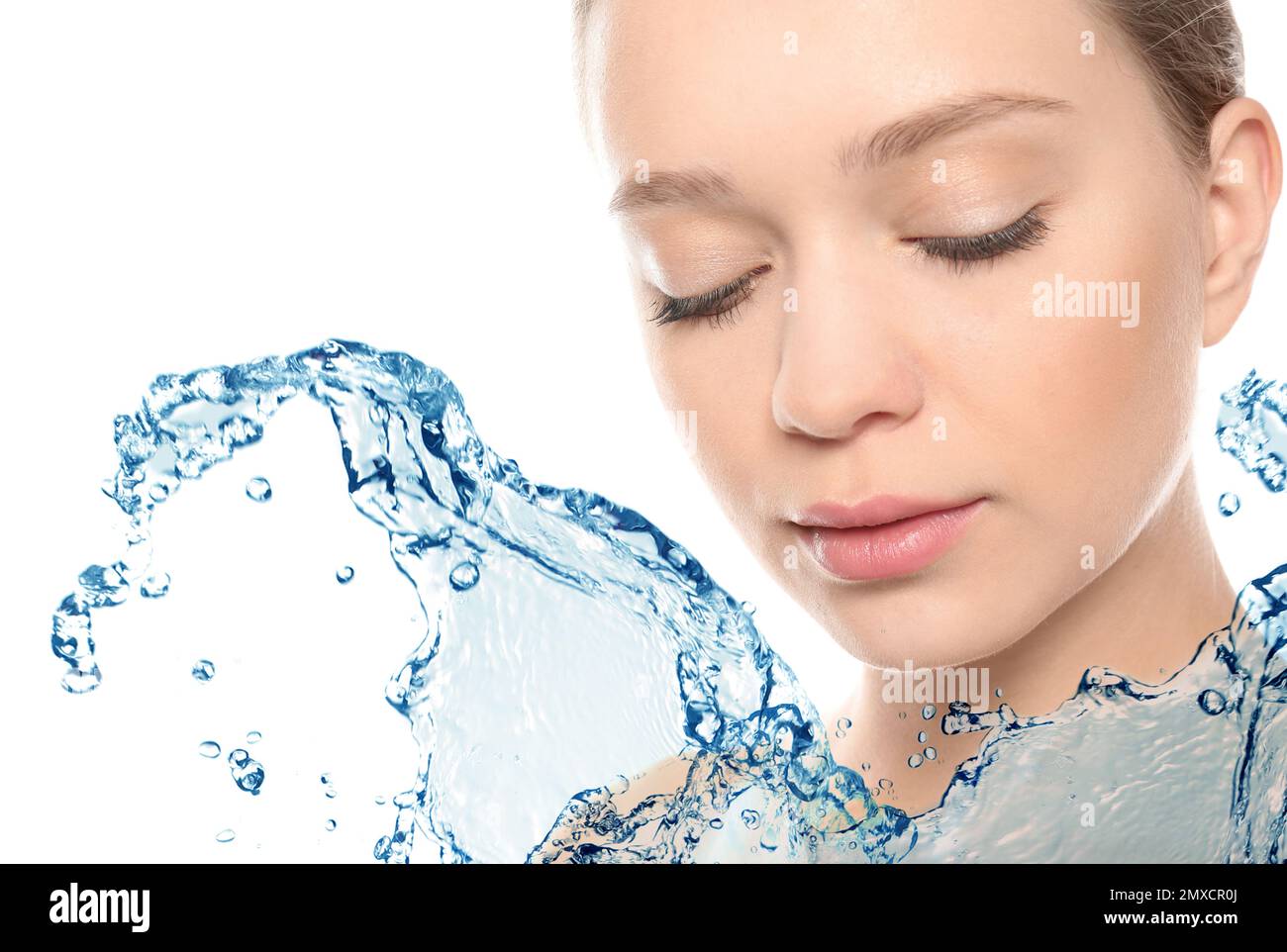 Beautiful woman with perfect skin and splash of clear water on white ...