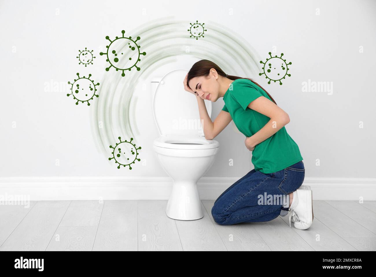 Young woman suffering from nausea at toilet bowl and bacteria ...